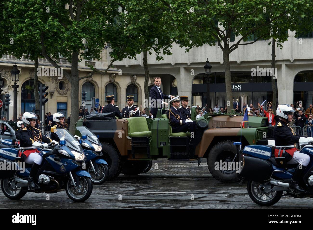 New French president Emmanuel Macron on the Champs Elysees avenue and ...