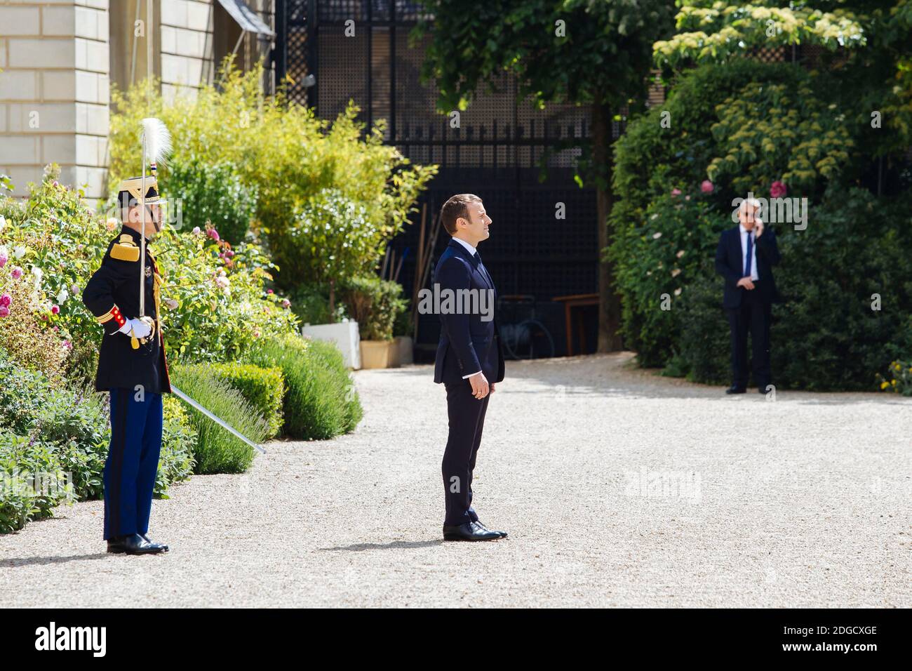 French President-elect Emmanuel Macron reviews troops in the gardens of ...