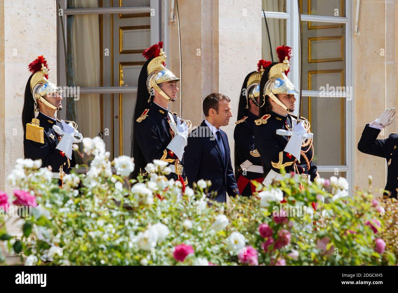 French President-elect Emmanuel Macron reviews troops in the gardens of ...
