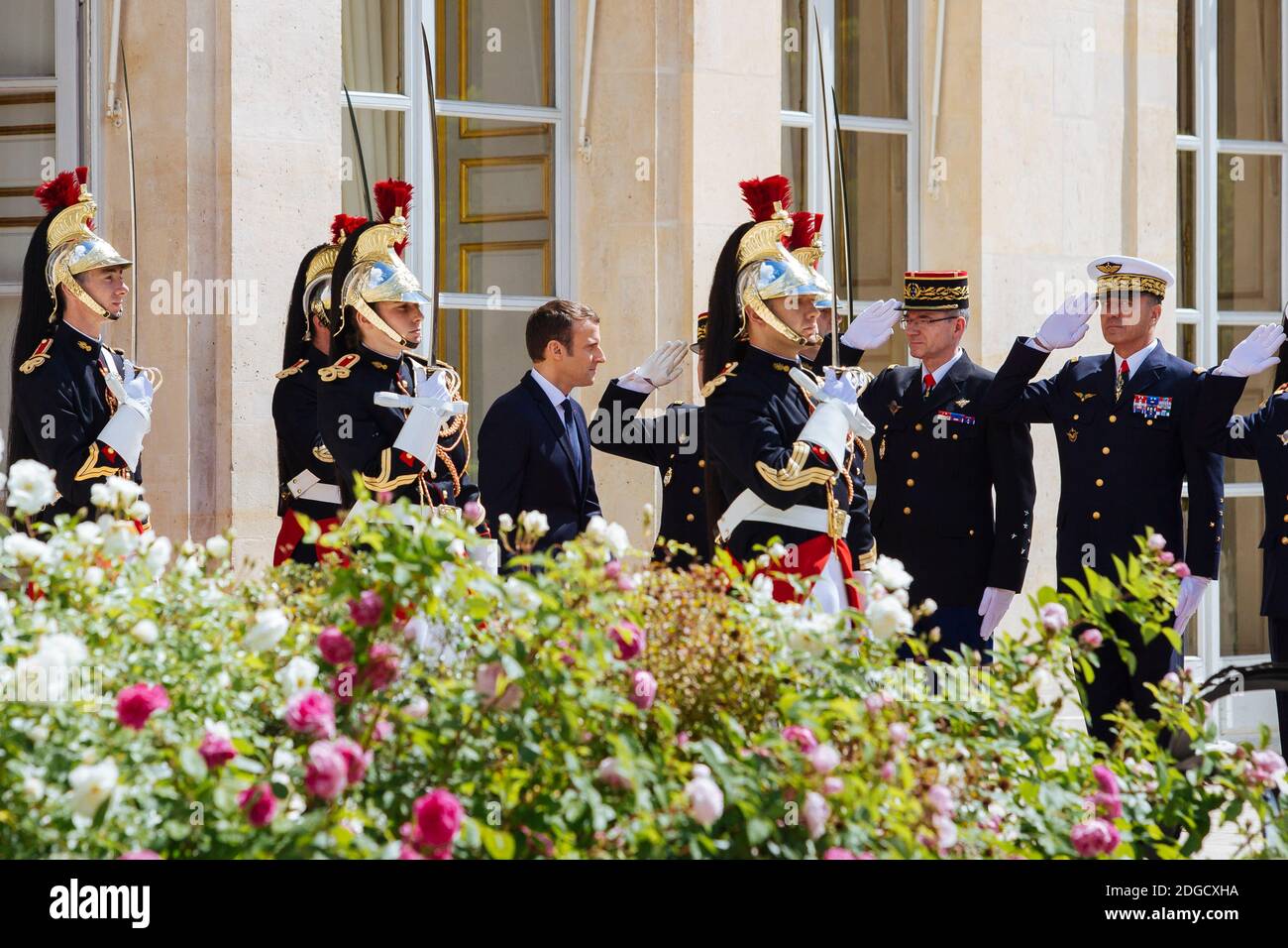 French President-elect Emmanuel Macron reviews troops in the gardens of ...