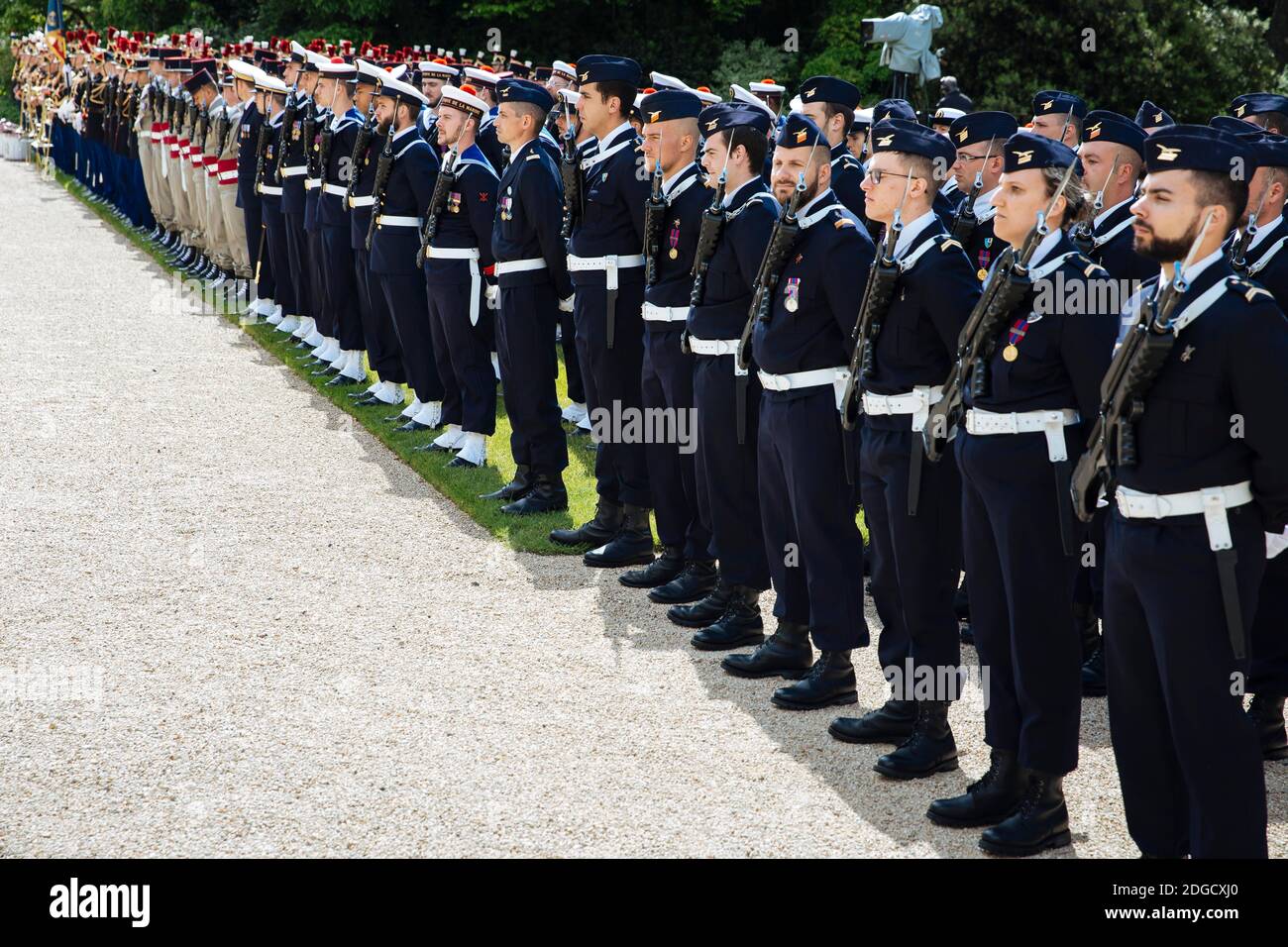 French President-elect Emmanuel Macron reviews troops in the gardens of ...