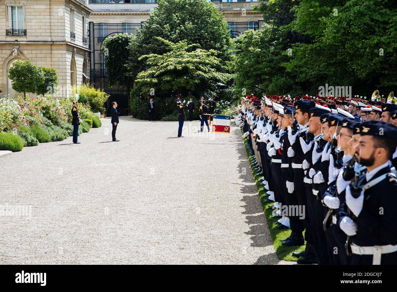French President-elect Emmanuel Macron reviews troops in the gardens of ...
