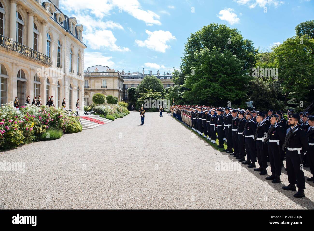 French President-elect Emmanuel Macron reviews troops in the gardens of ...