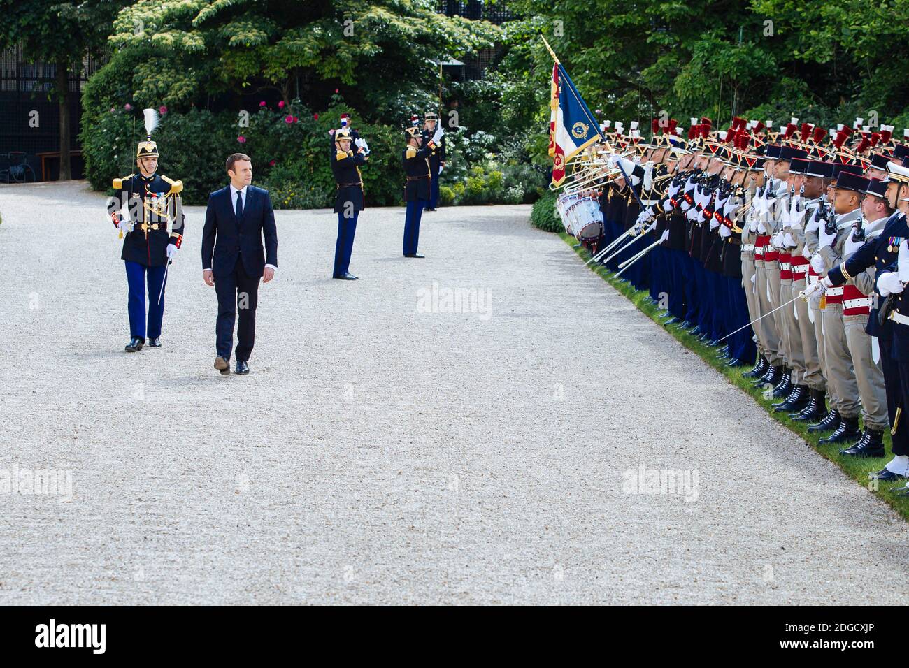 French President-elect Emmanuel Macron reviews troops in the gardens of ...