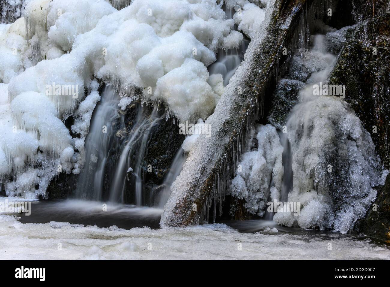 Beautiful frozen waterfall in the winter. Frozen water an ice ...