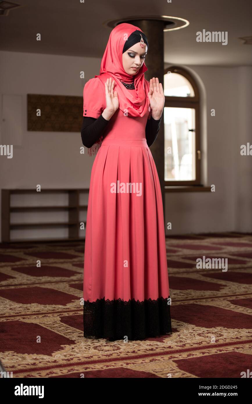 Muslim Woman Making Traditional Prayer to God Allah in the Mosque Stock ...