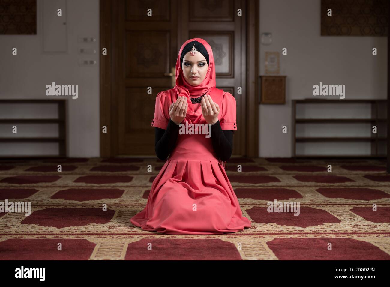 Attractive Woman Making Traditional Prayer to God Allah in the Mosque ...