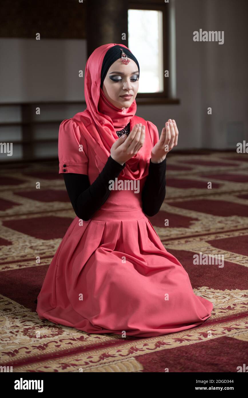 Muslim Woman Making Traditional Prayer to God Allah in the Mosque Stock ...