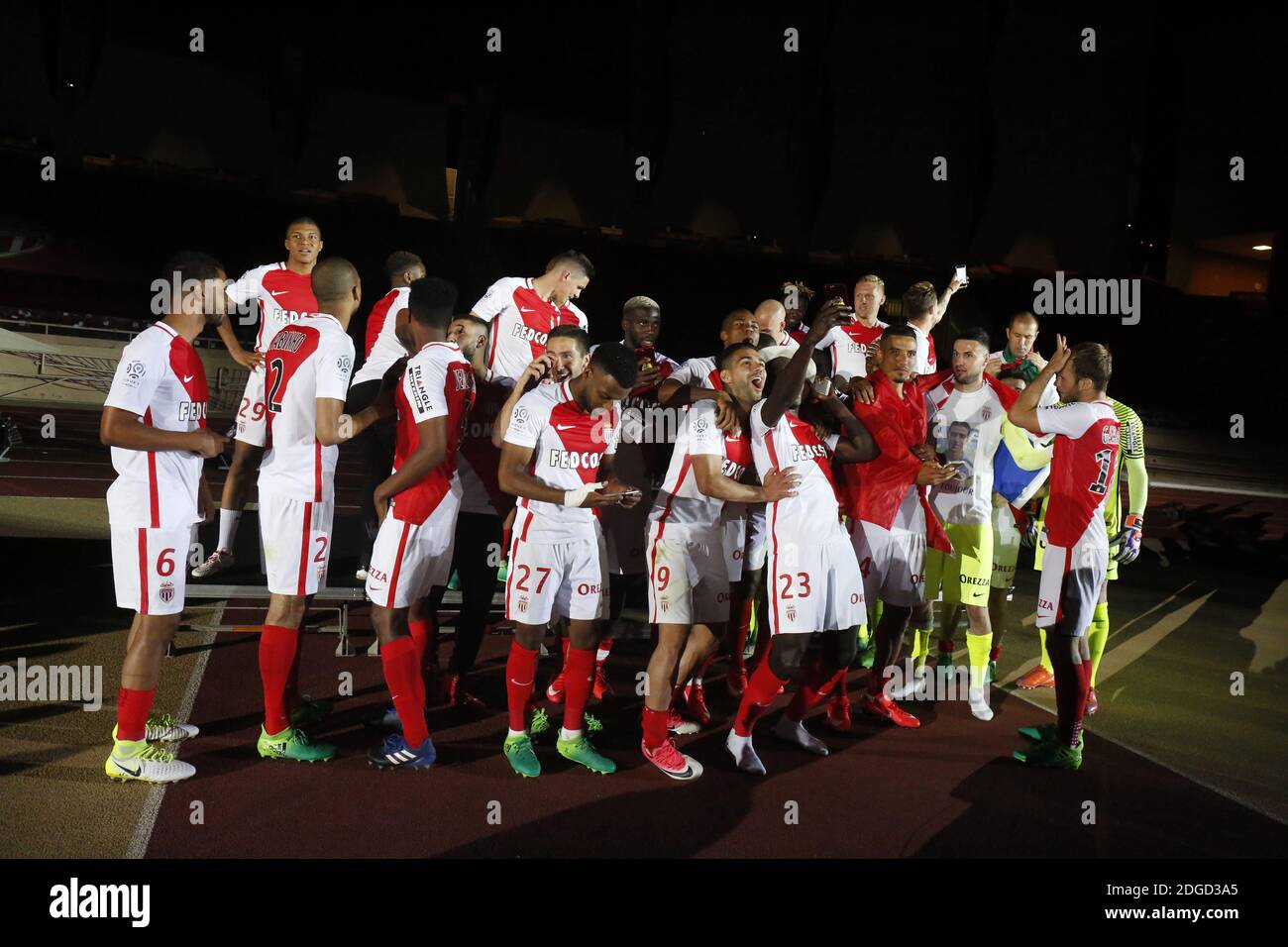AS Monaco's teammates celebrate winning the title after the Ligue 1 ...