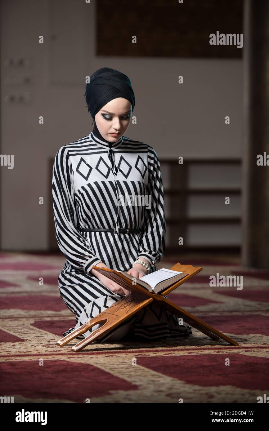 Muslim Woman Making Traditional Prayer to God Allah in the Mosque Stock ...