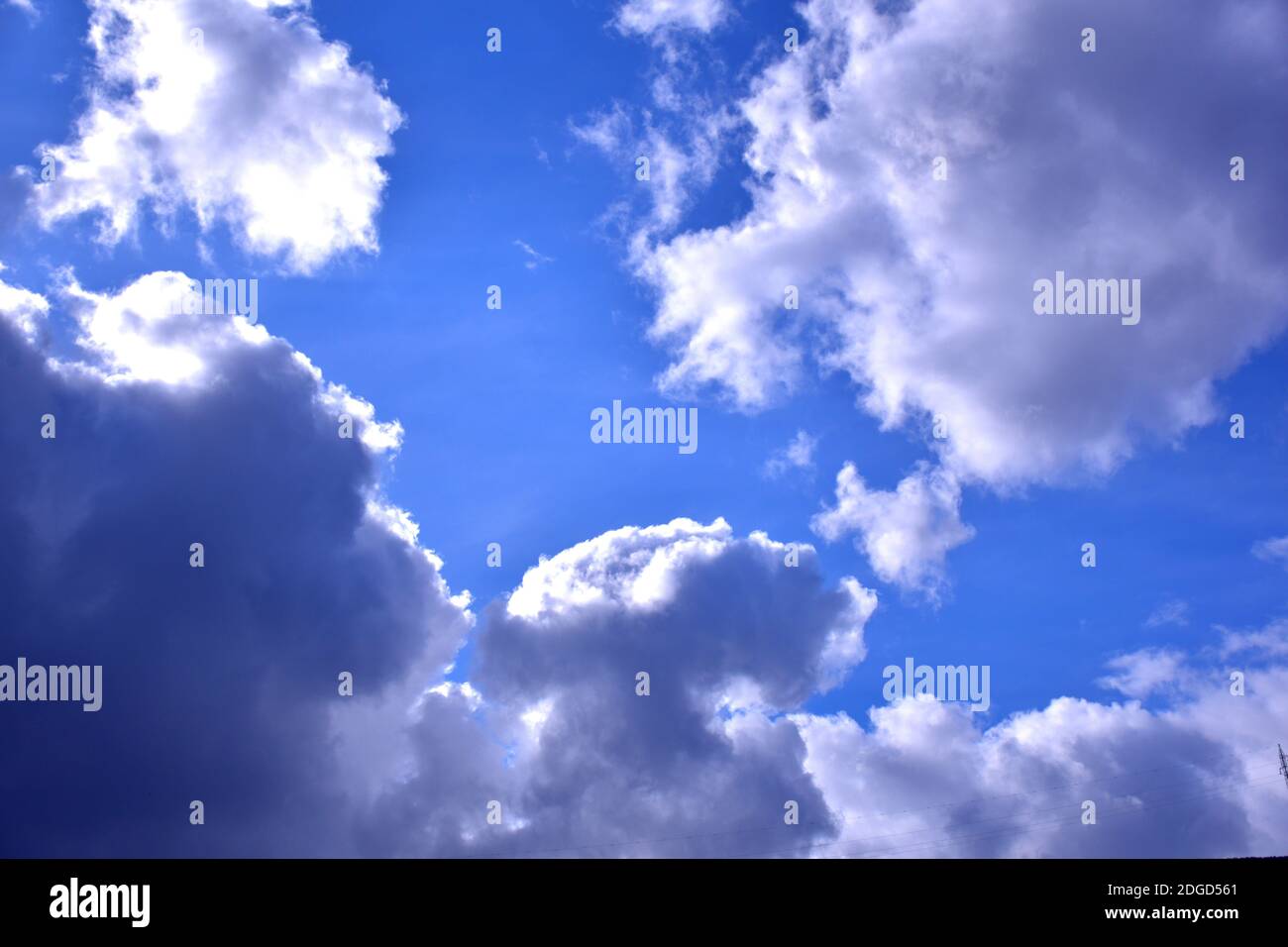 Blue spring sky with clouds. Munilla, La Rioja Stock Photo - Alamy