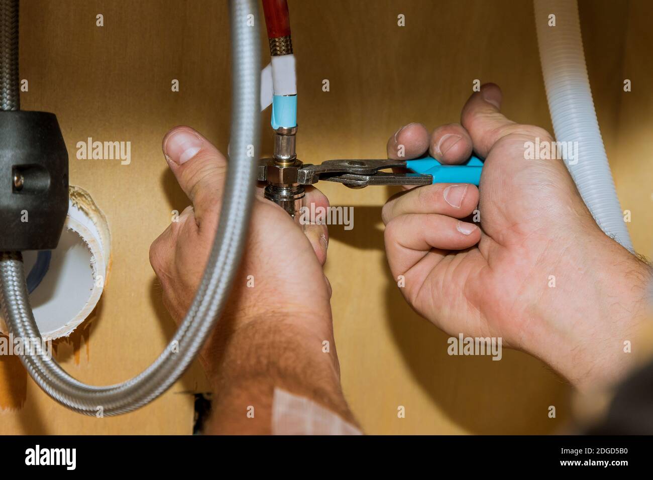 Installing hands hi-res stock photography and images - Alamy
