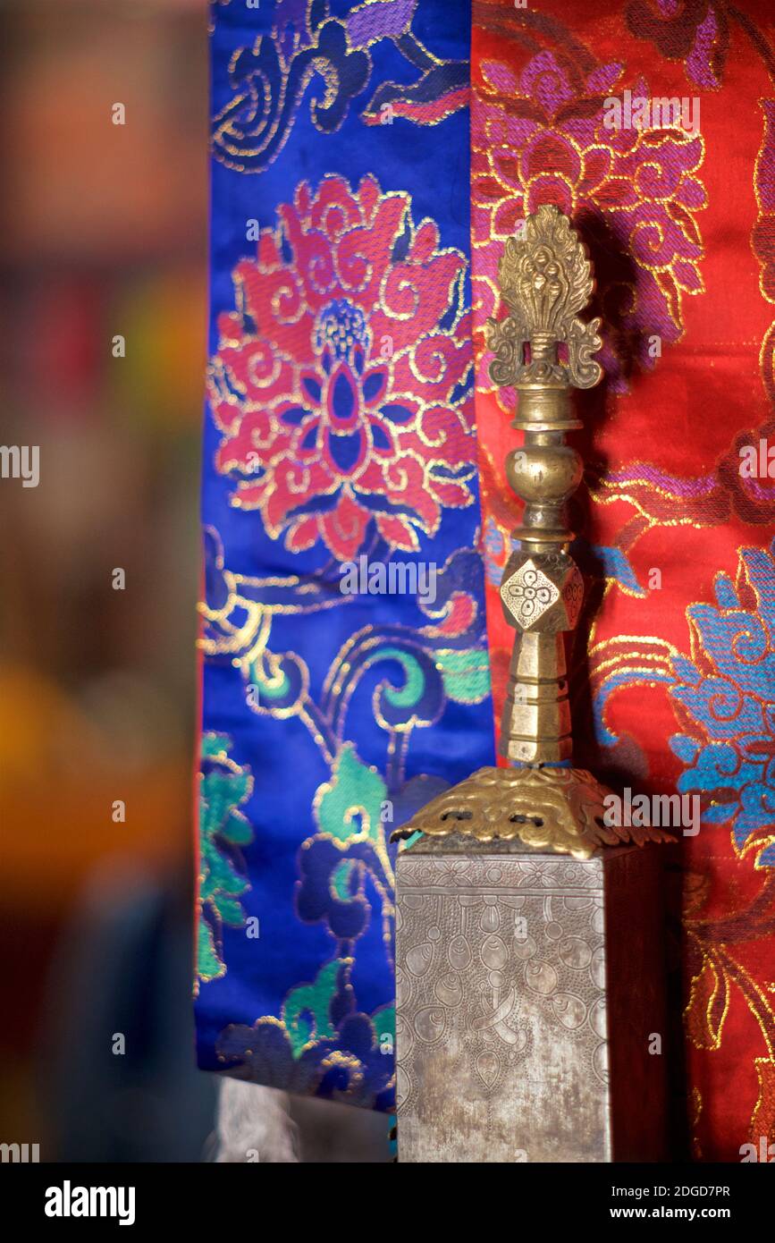 Detail of Tibetan buddhist textiles and metalwork at Karsha monastery ...