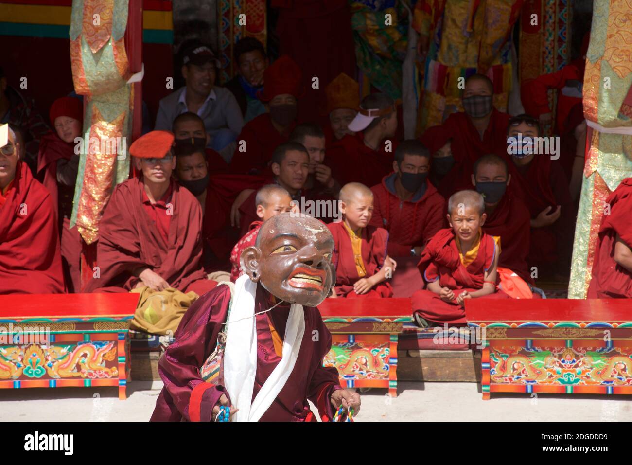 Resident monks watching a cham dance at the annual Zanskar or Karsha ...