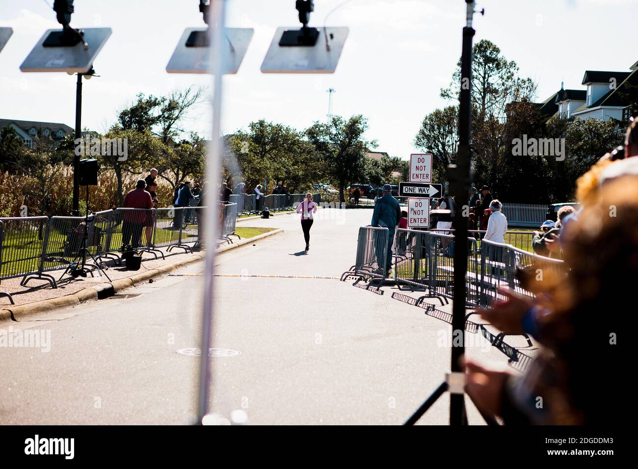Winner crossing finish line of race hi-res stock photography and images ...