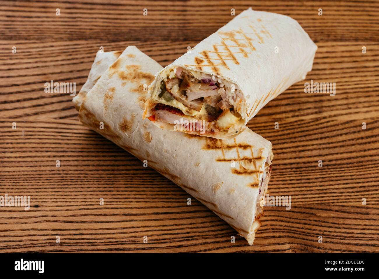 Turkish Shawarma on a wooden Board and light background Stock Photo - Alamy