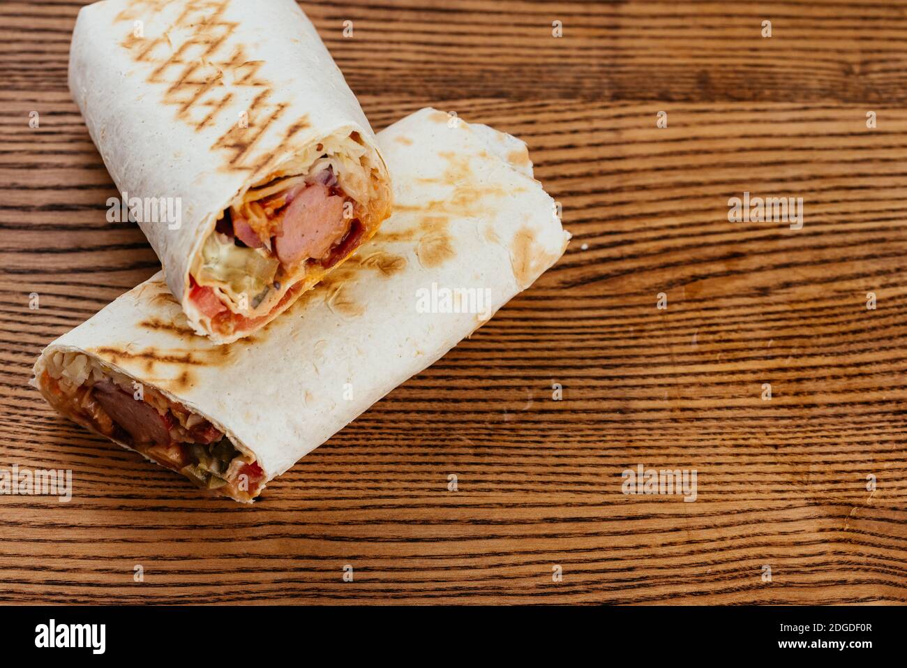 Turkish Shawarma on a wooden Board and light background Stock Photo - Alamy