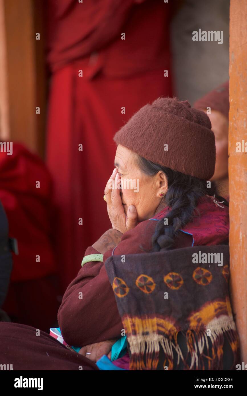 Ladakhi women in traditional dress, including a tie-dyed woollen shawl ...