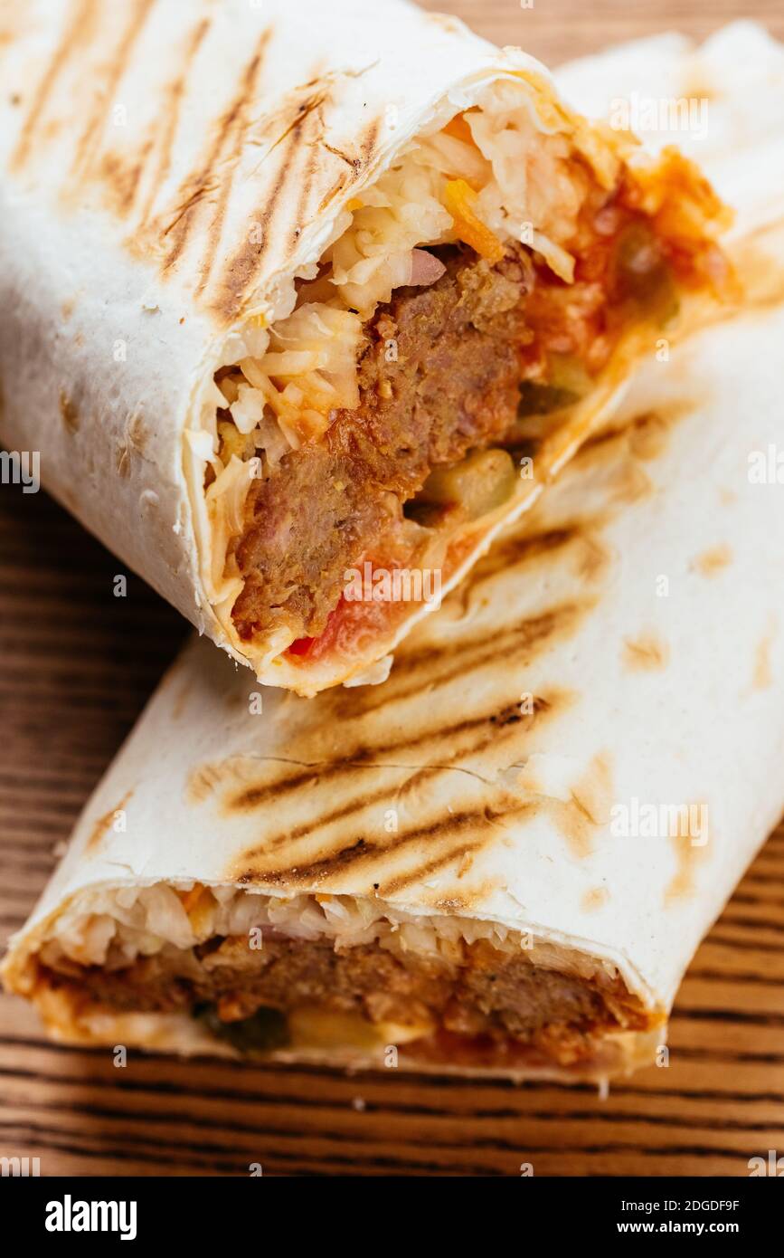 Turkish Shawarma on a wooden Board and light background Stock Photo - Alamy