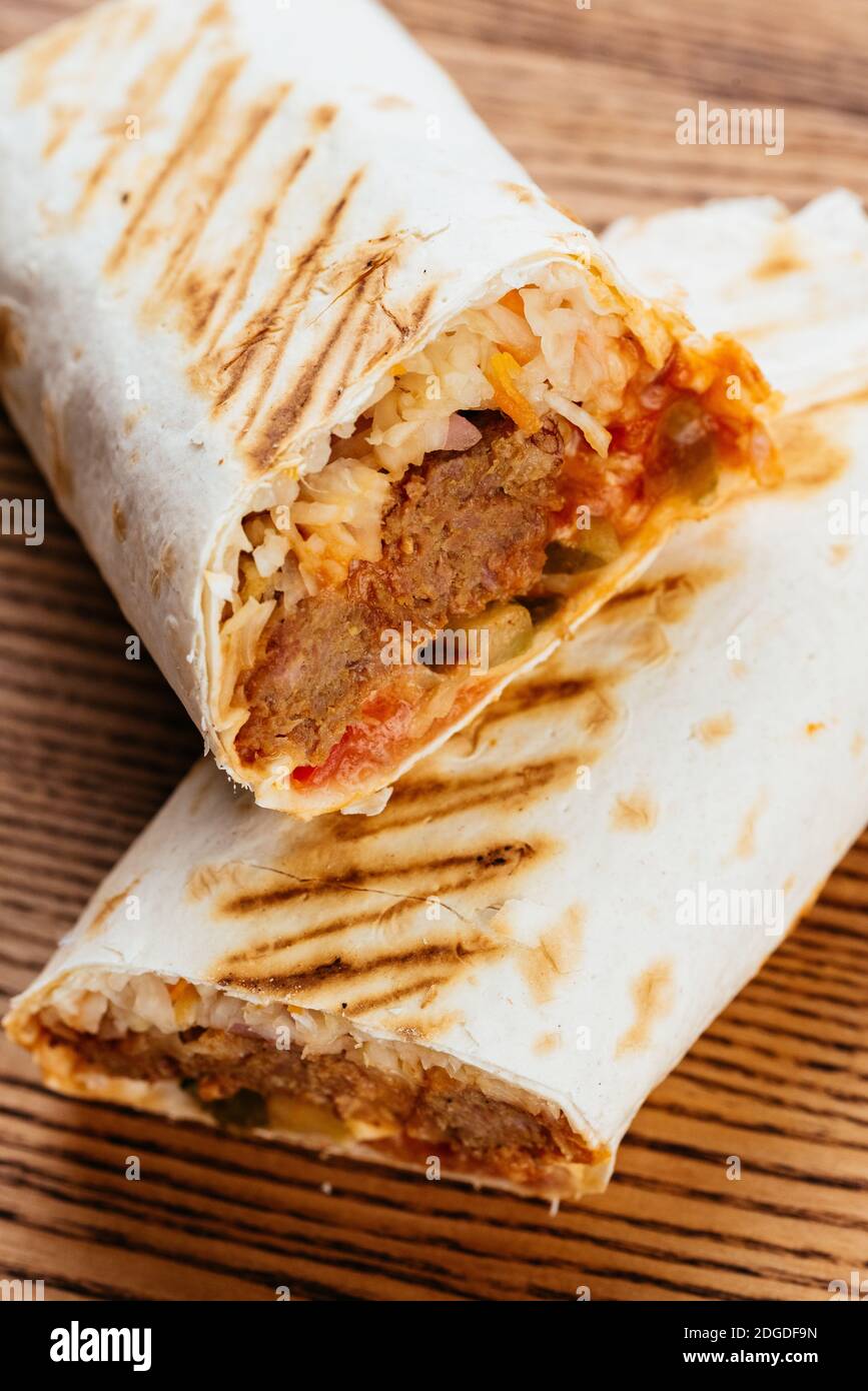Turkish Shawarma on a wooden Board and light background Stock Photo - Alamy