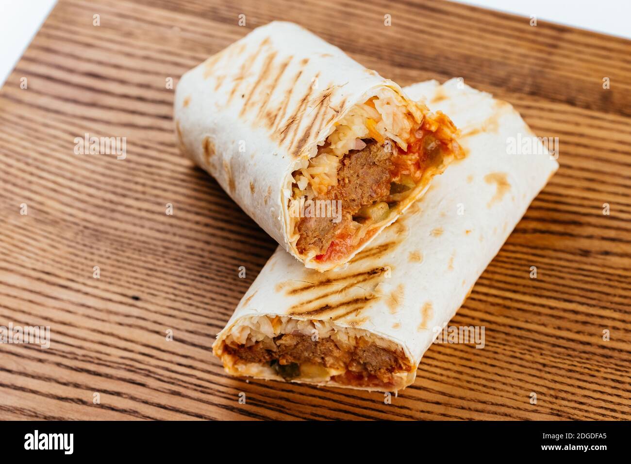 Turkish Shawarma on a wooden Board and light background Stock Photo - Alamy