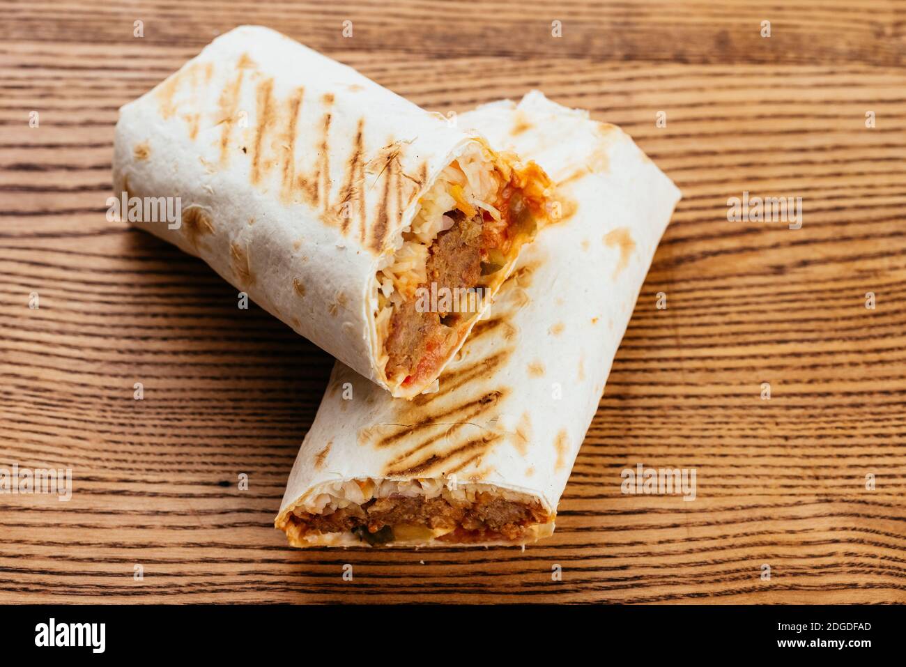 Turkish Shawarma on a wooden Board and light background Stock Photo - Alamy