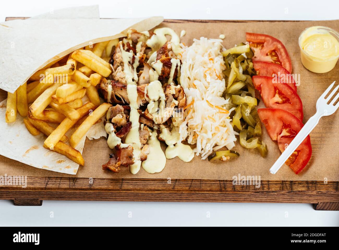 Turkish Shawarma on a wooden Board and light background Stock Photo - Alamy