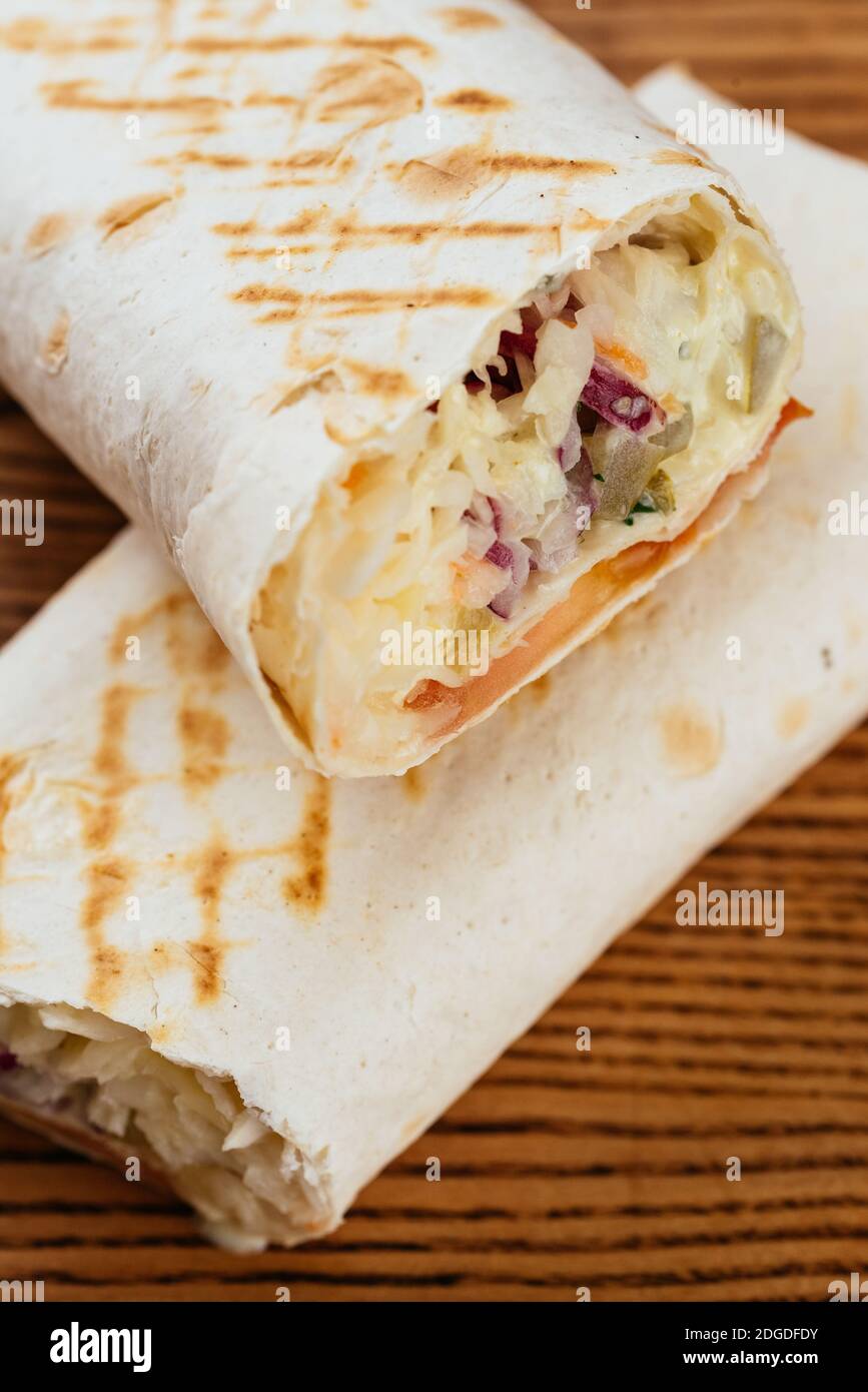 Turkish Shawarma on a wooden Board and light background Stock Photo - Alamy