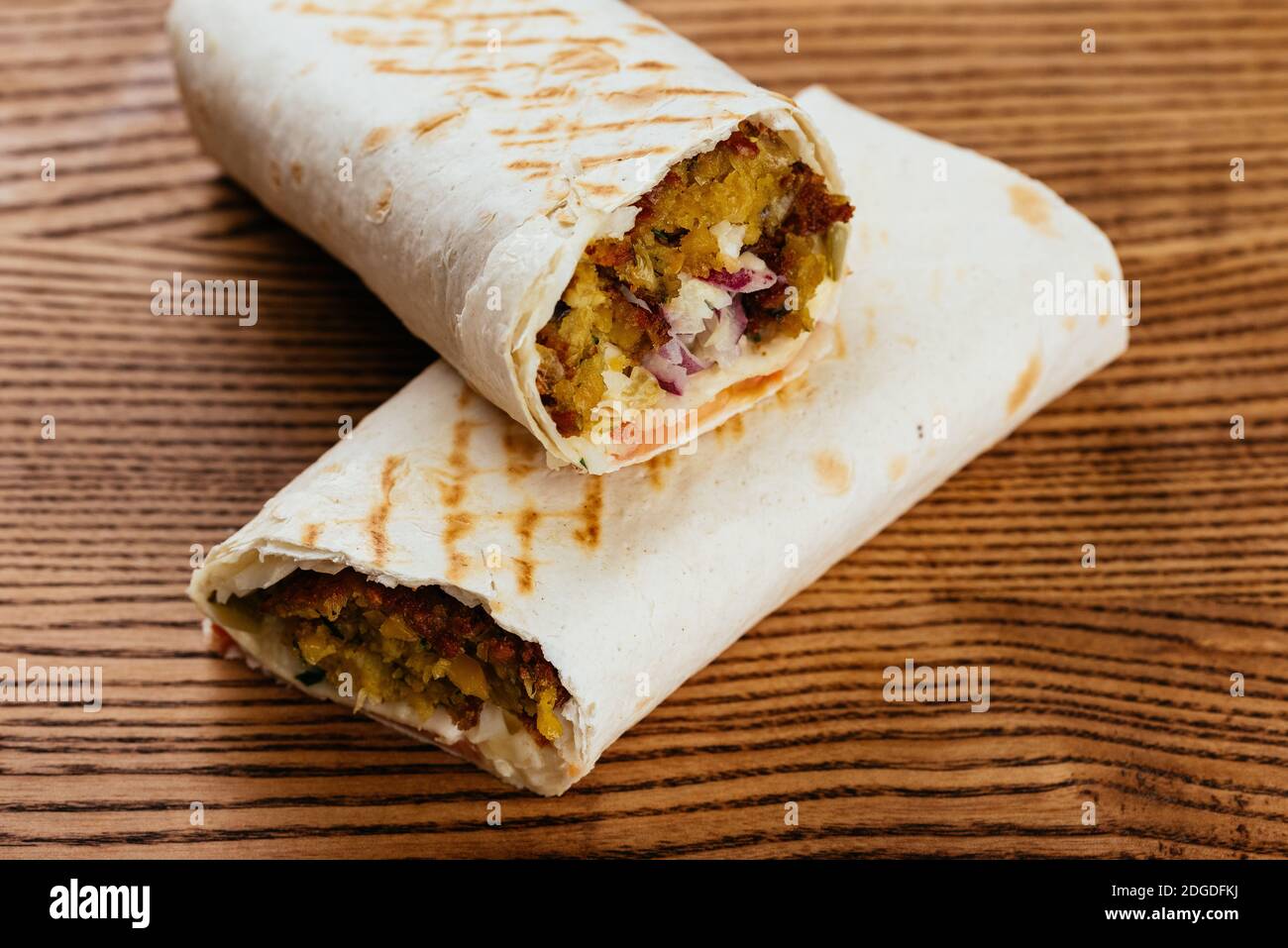 Turkish Shawarma on a wooden Board and light background Stock Photo - Alamy