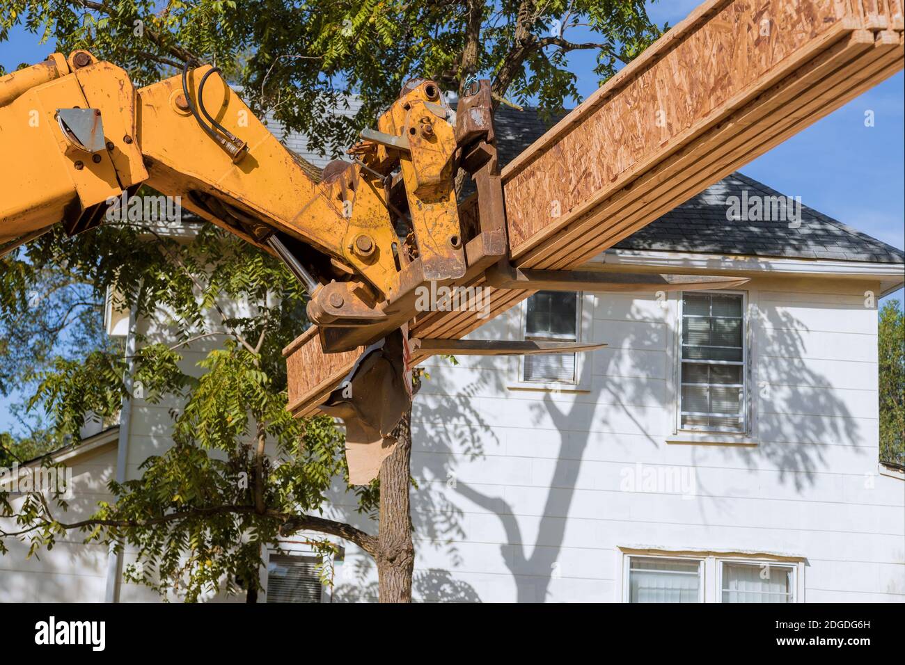 Forklift stacker loader construction showing joists trusses Stock Photo ...