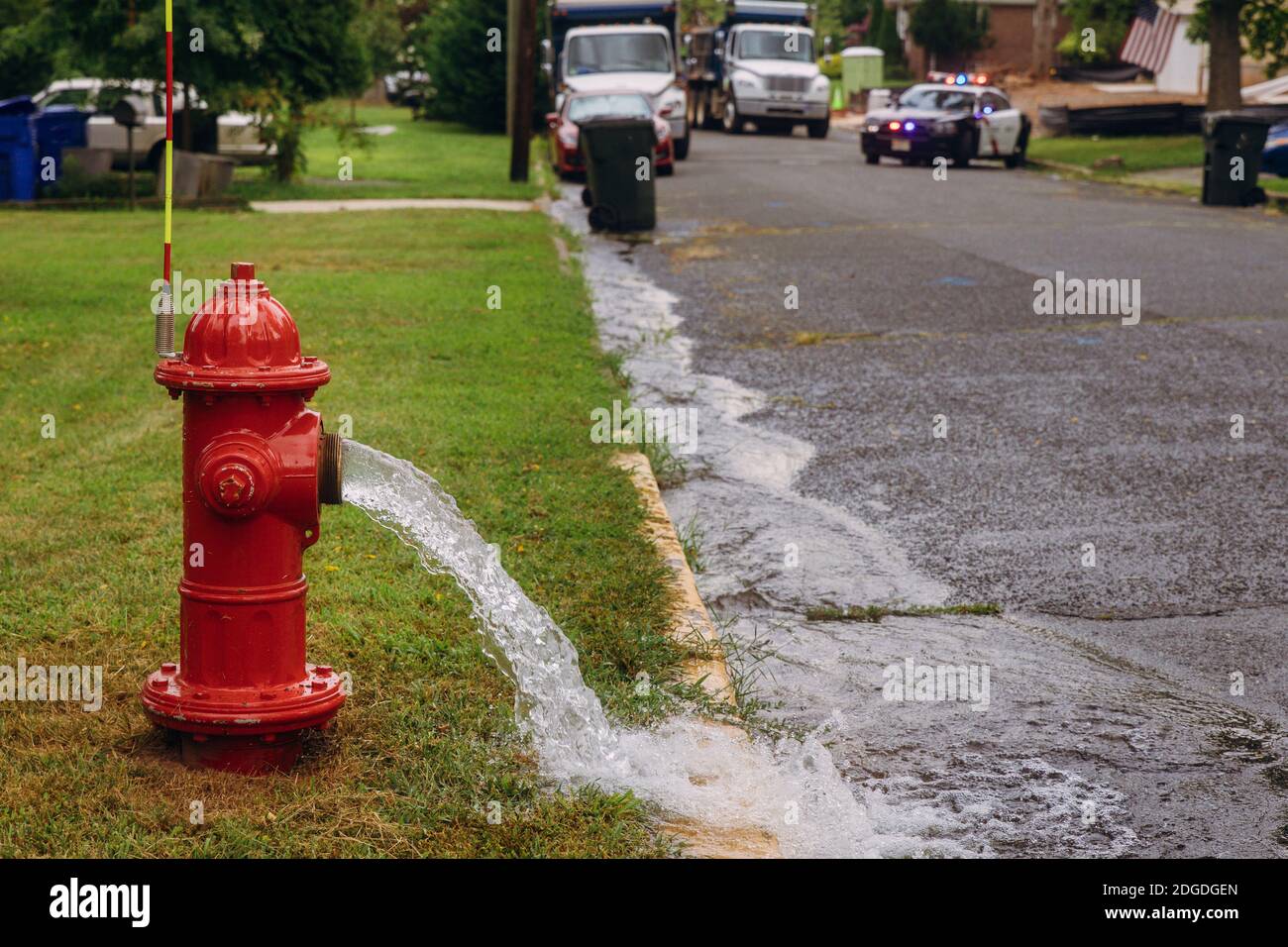 Open in industrial fire hydrant being strong water sprayed Stock Photo ...