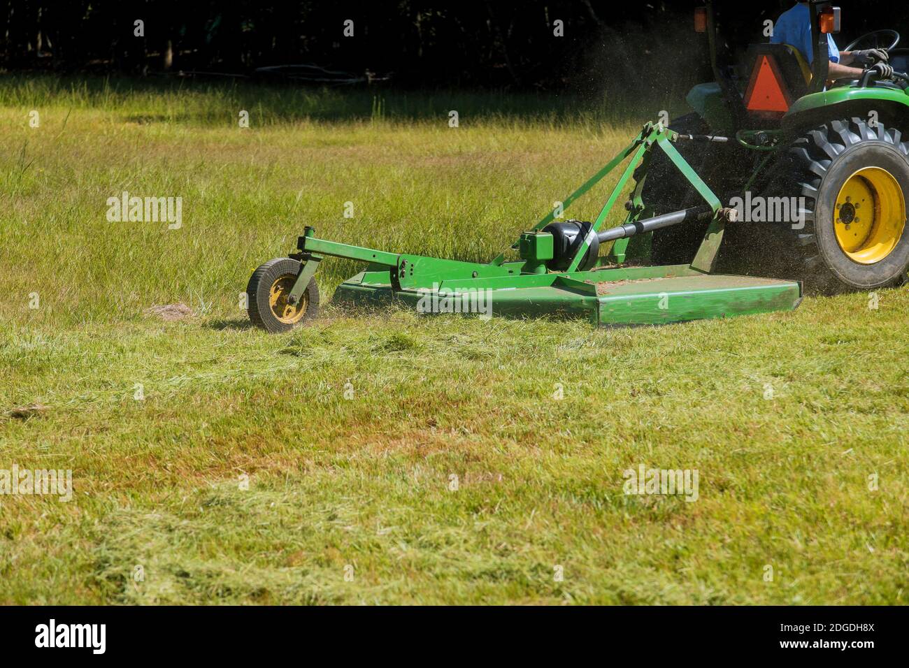 Gardener cutting grass hi-res stock photography and images - Alamy