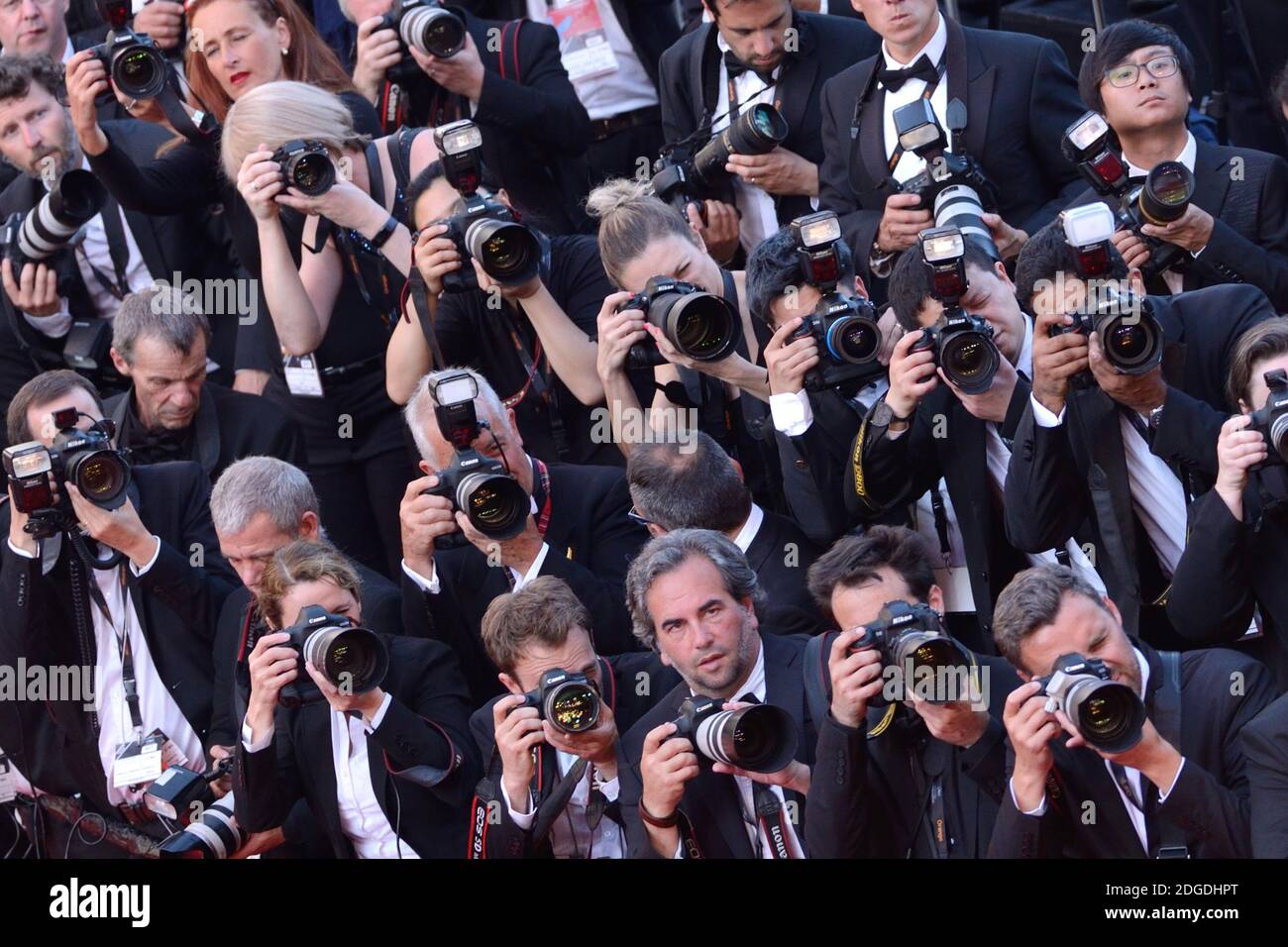 Photographers working during the 70th anniversary ceremony as part of ...