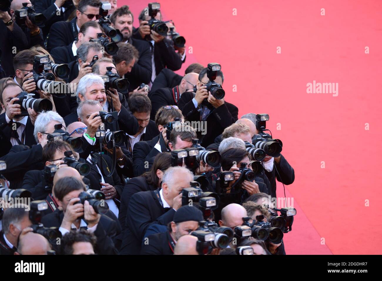 Photographers working during the 70th anniversary ceremony as part of ...