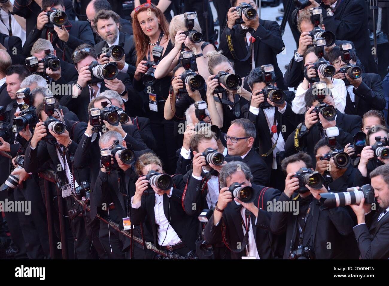Photographers working during the 70th anniversary ceremony as part of ...