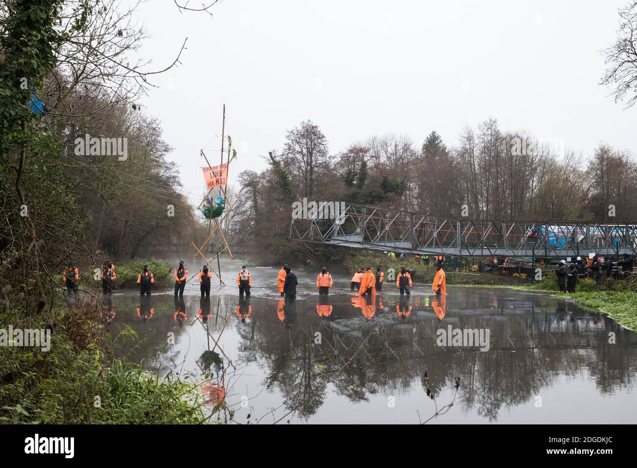 Denham, UK. 8th December, 2020. HS2 security guards form a line across ...
