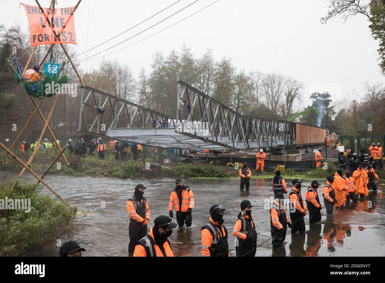 Denham, UK. 8th December, 2020. HS2 security guards form a line across ...