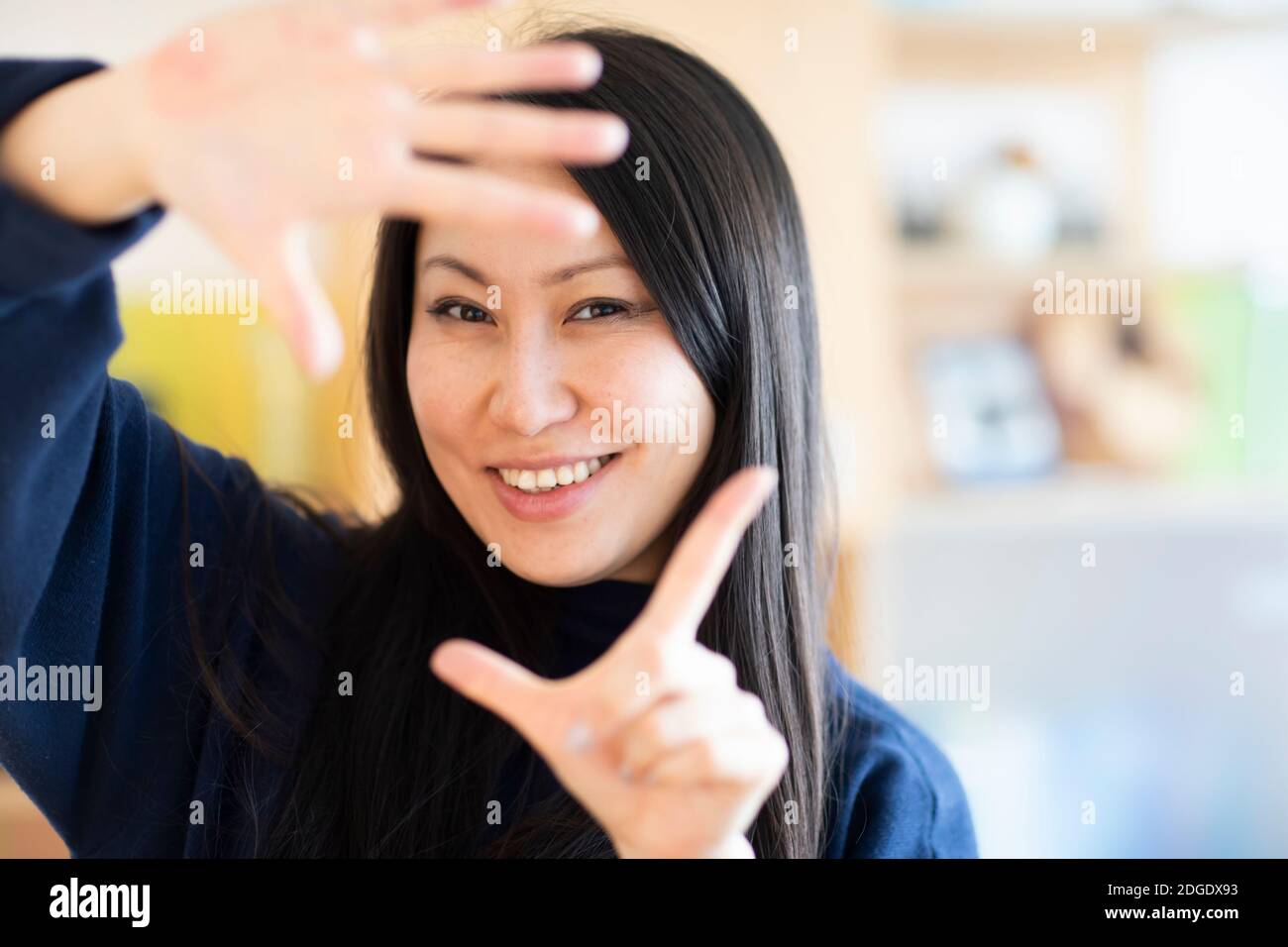 young woman asia female with long hair making hand signs Stock Photo ...