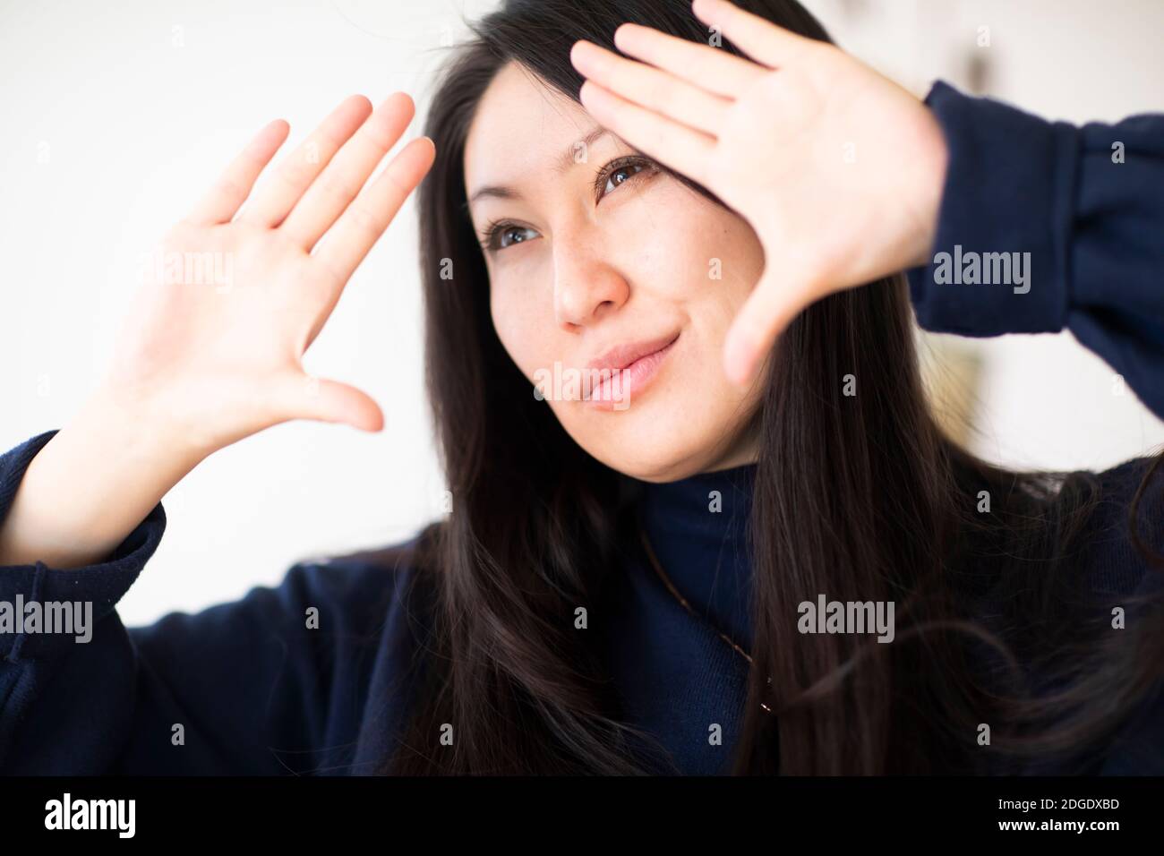 young woman asia female with long hair making hand signs Stock Photo ...