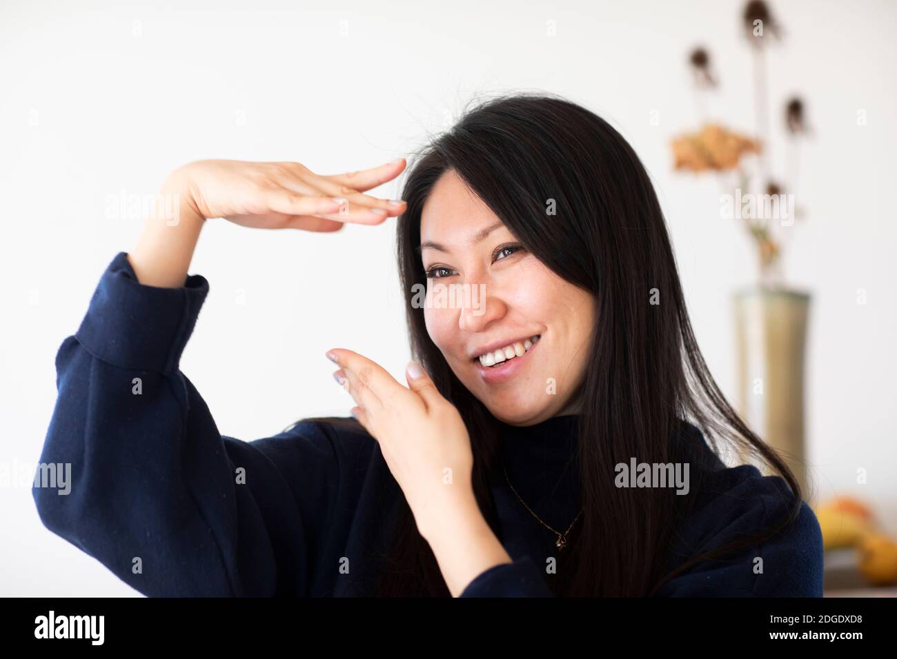young woman asia female with long hair making hand signs Stock Photo ...