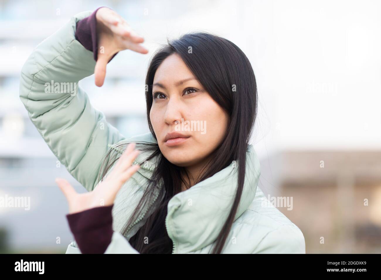 young woman asia female with long hair making hand signs Stock Photo ...