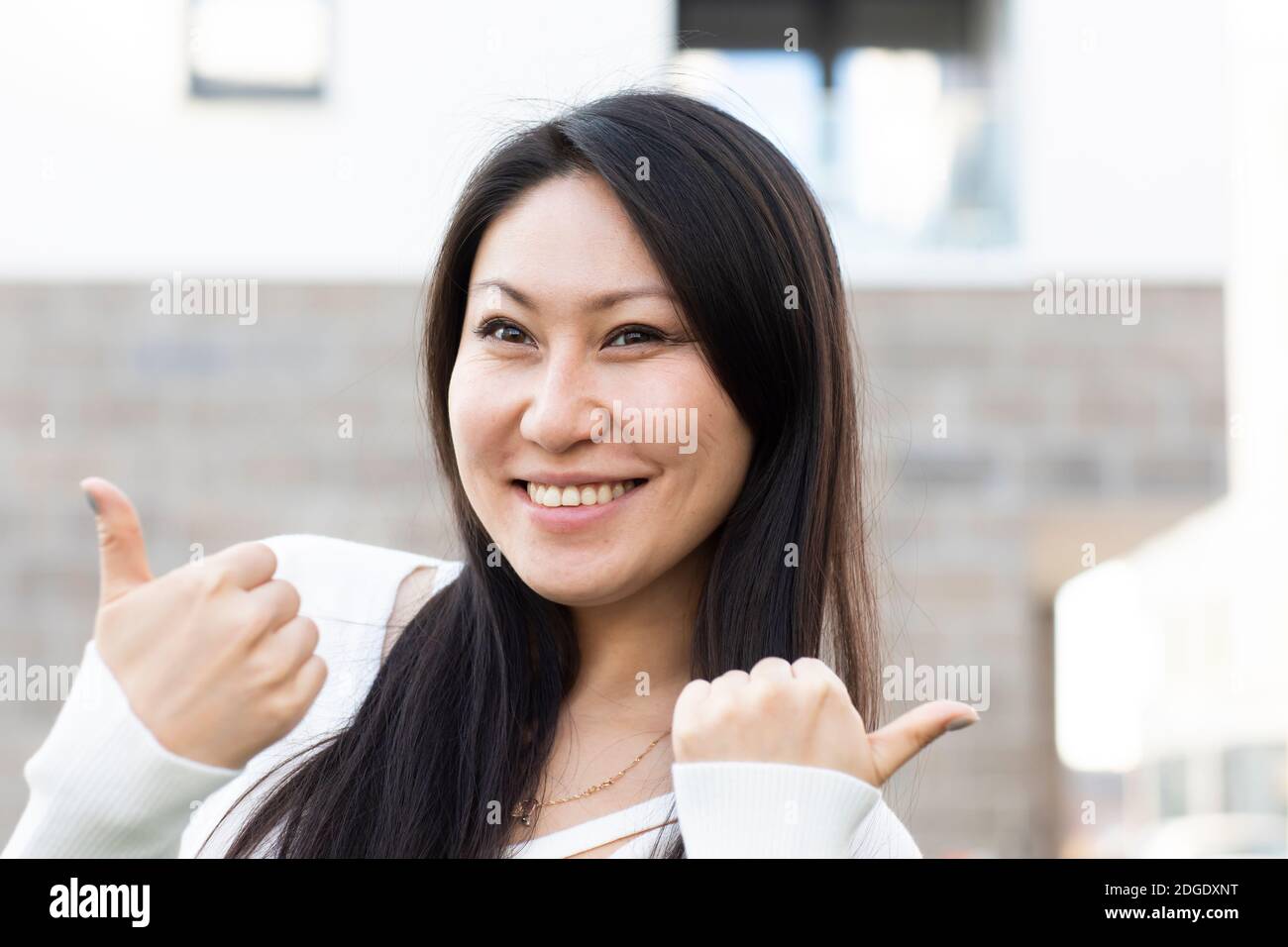 young woman asia female with long hair making hand signs Stock Photo ...