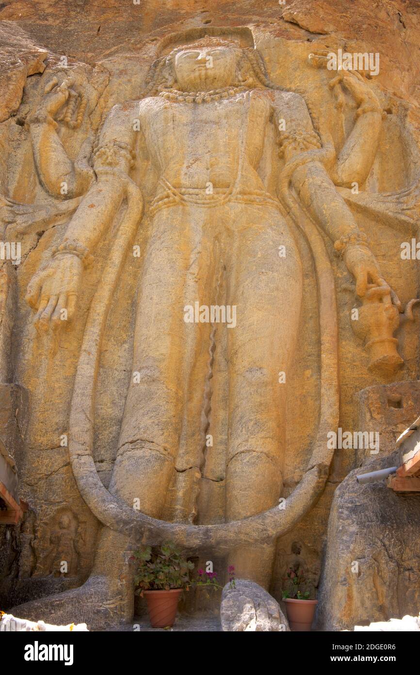 Rock carved giant 8th century statue of Maitreya Buddha at Mulbekh ...