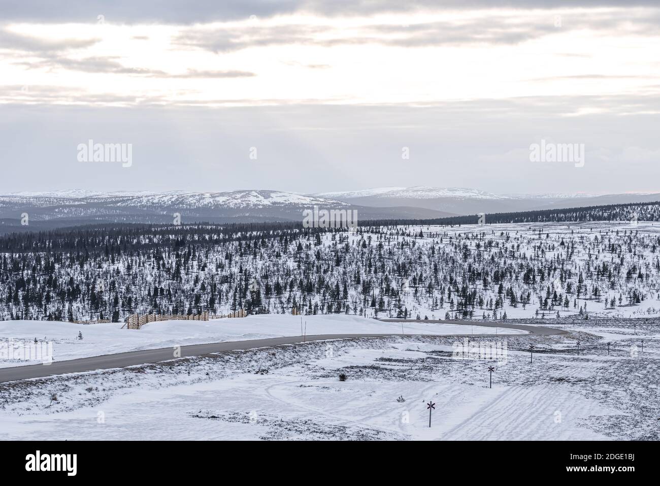 View of the snowy hills in severe nature of northern Finland Stock ...