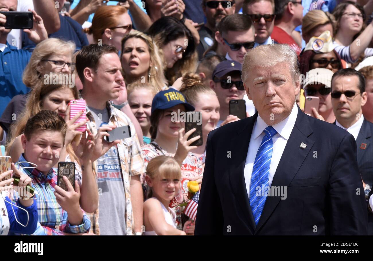 President Donald Trump participates in a wreath-laying ceremony at the ...