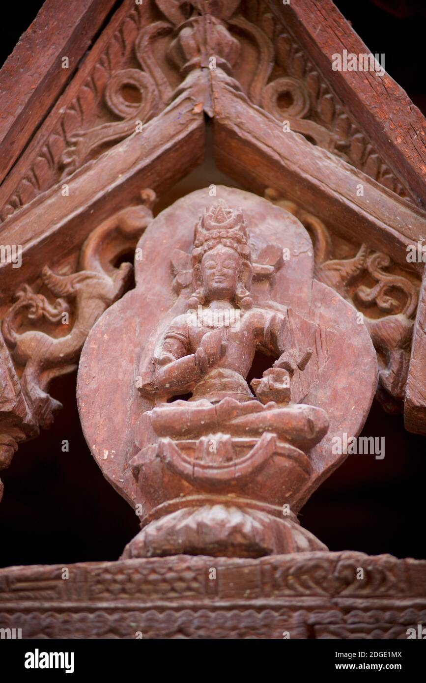 Ornate historical wooden Buddhist carvings on the ancient entranceways ...