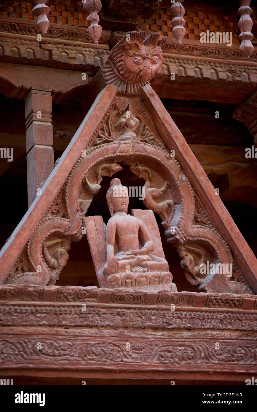 Ornate historical wooden Buddhist carvings on the ancient entranceways ...
