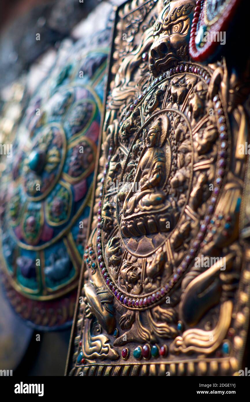 Intricate metalwork souvenirs for sale on a market stall, Ladakh, Jammu ...