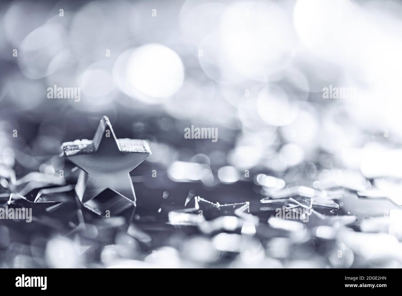 Macro photo of bright silver star Stock Photo - Alamy