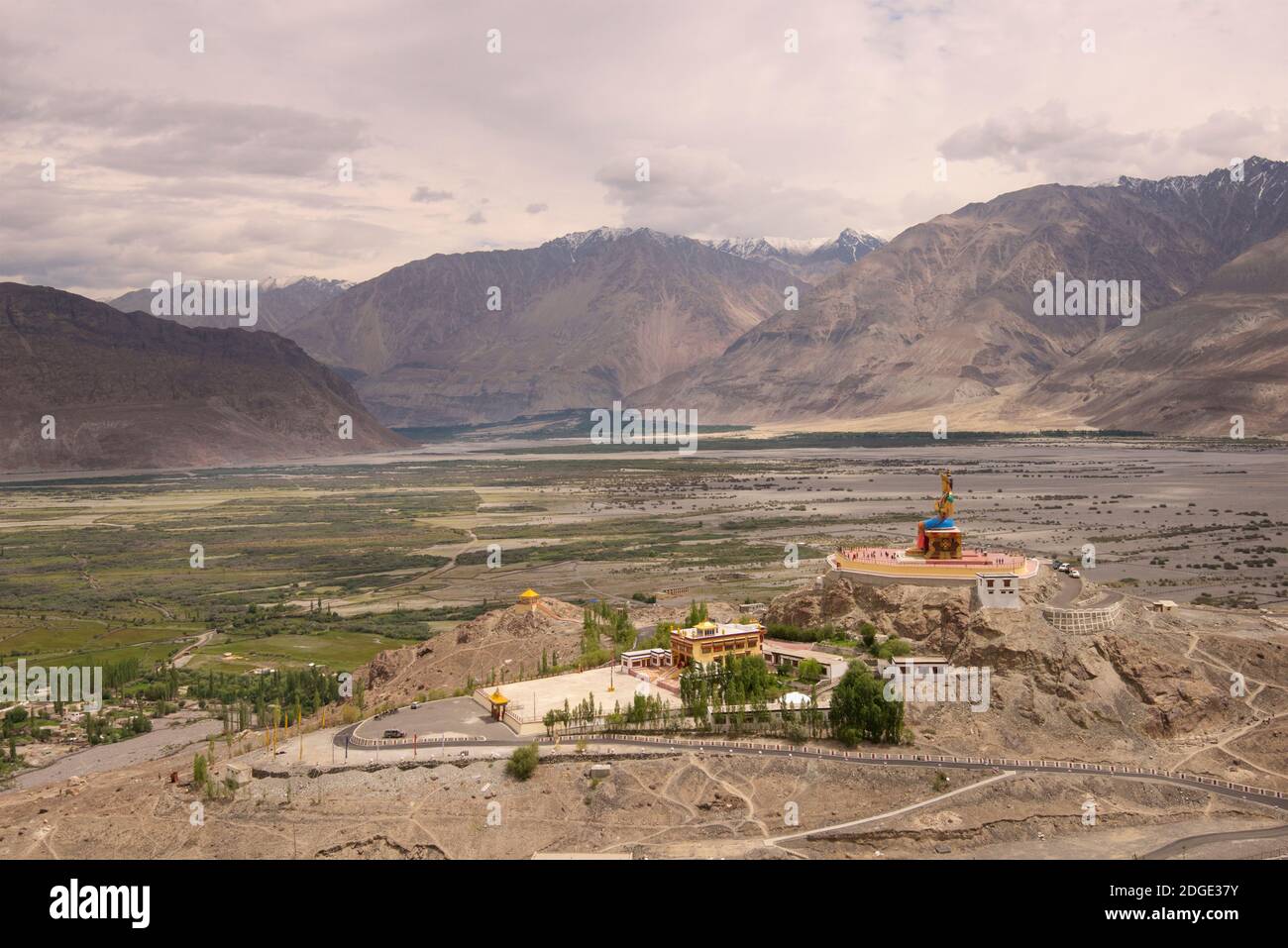 View of surrounding mountains and the large statue of buddha opposite ...